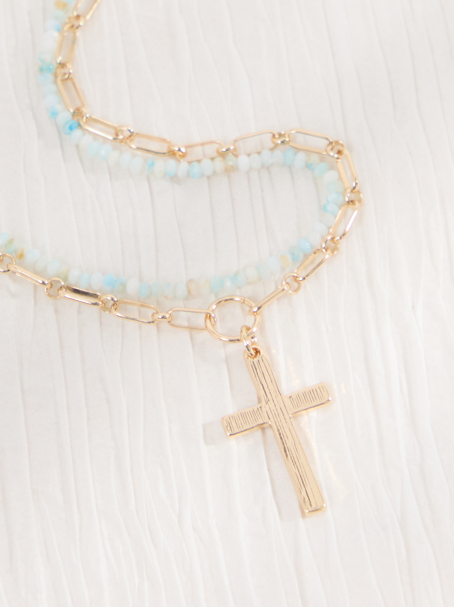 Chelsea Cross Beaded Blue Necklace in Gold | Altar'd State