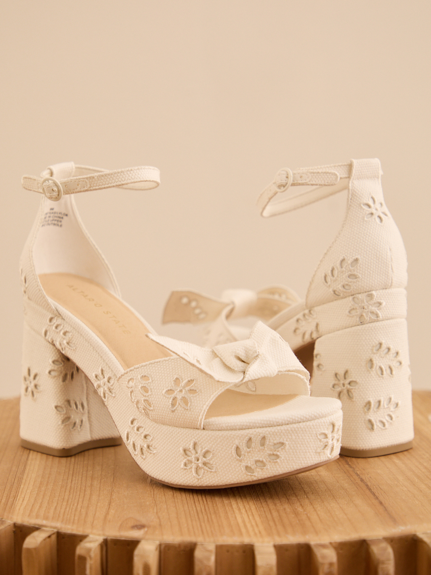 Liloa Eyelet Platform Heel in White | Altar'd State