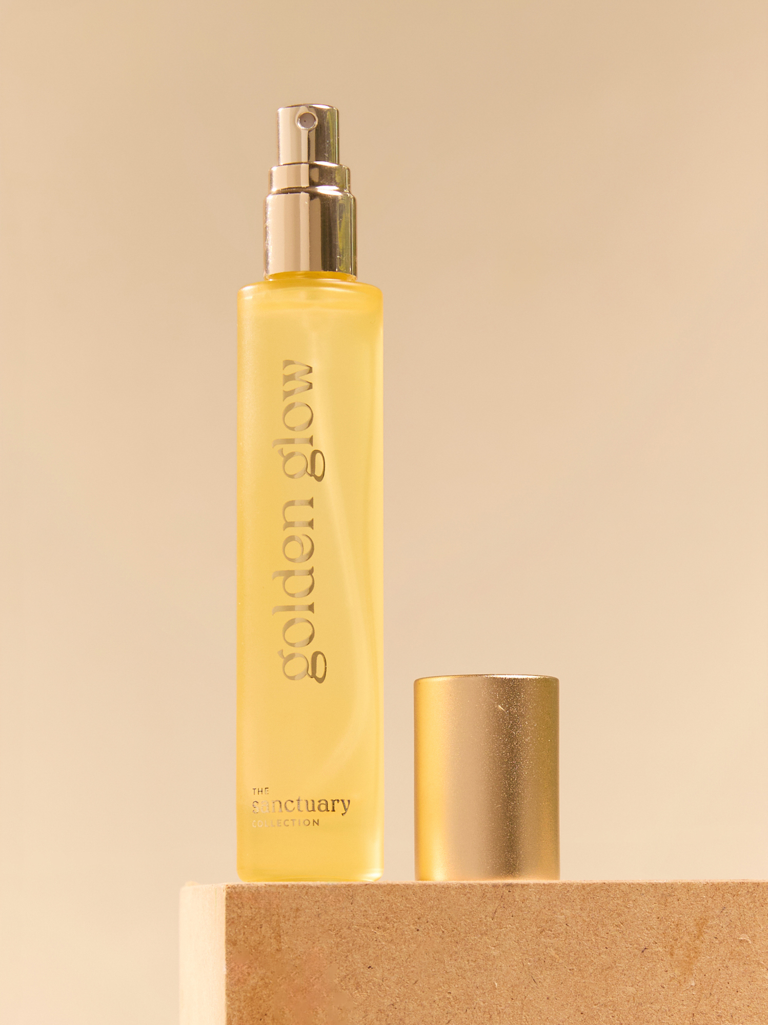 Golden Glow Travel Perfume in Yellow | Altar'd State